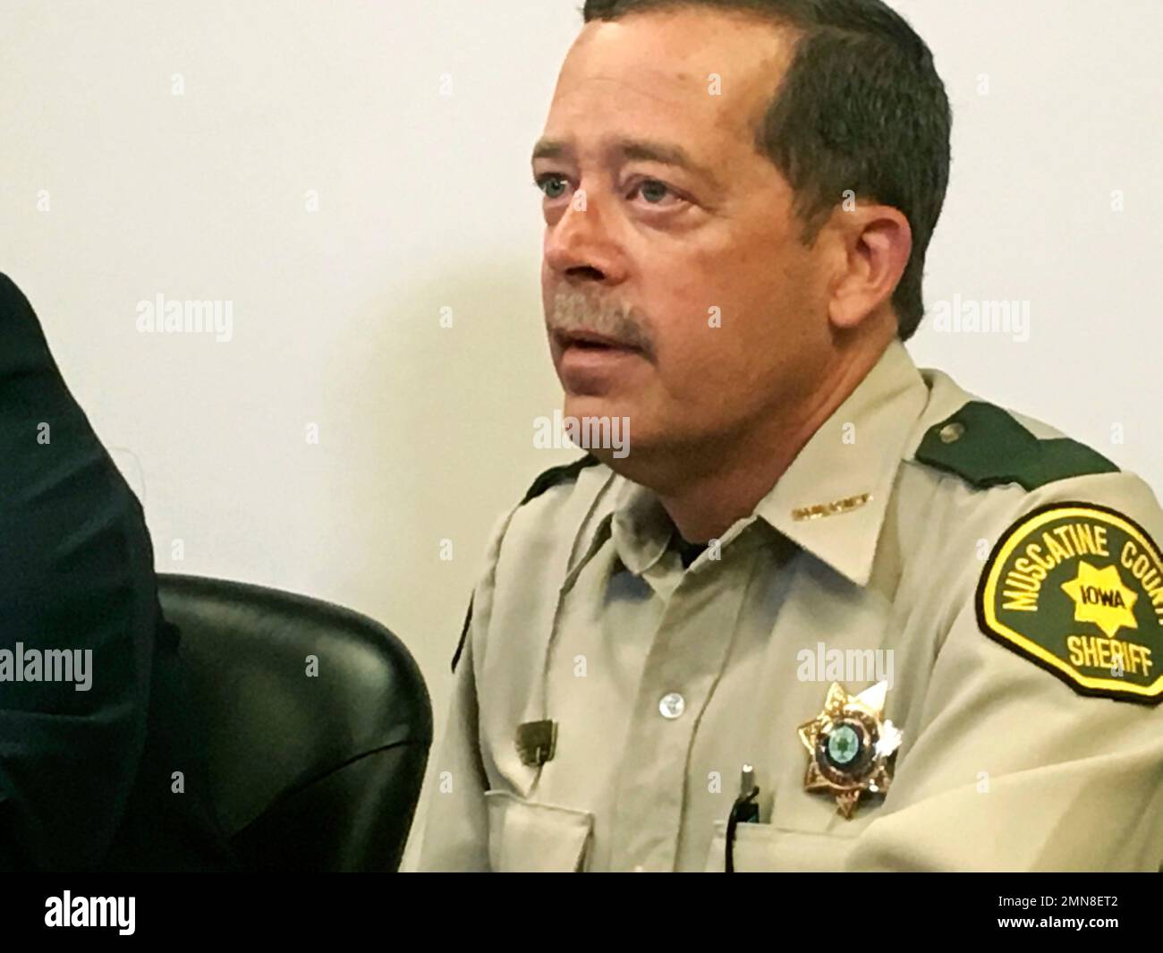 Muscatine County Sheriff C.J. Ryan speaks during a news conference in ...