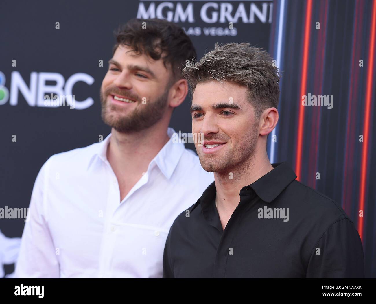 Alex Pall, left, and Andrew Taggart, of The Chainsmokers arrive at the ...