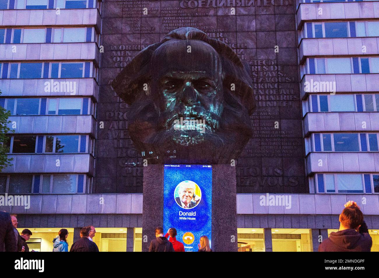 A video installation illuminates the Karl Marx Monument during a press ...