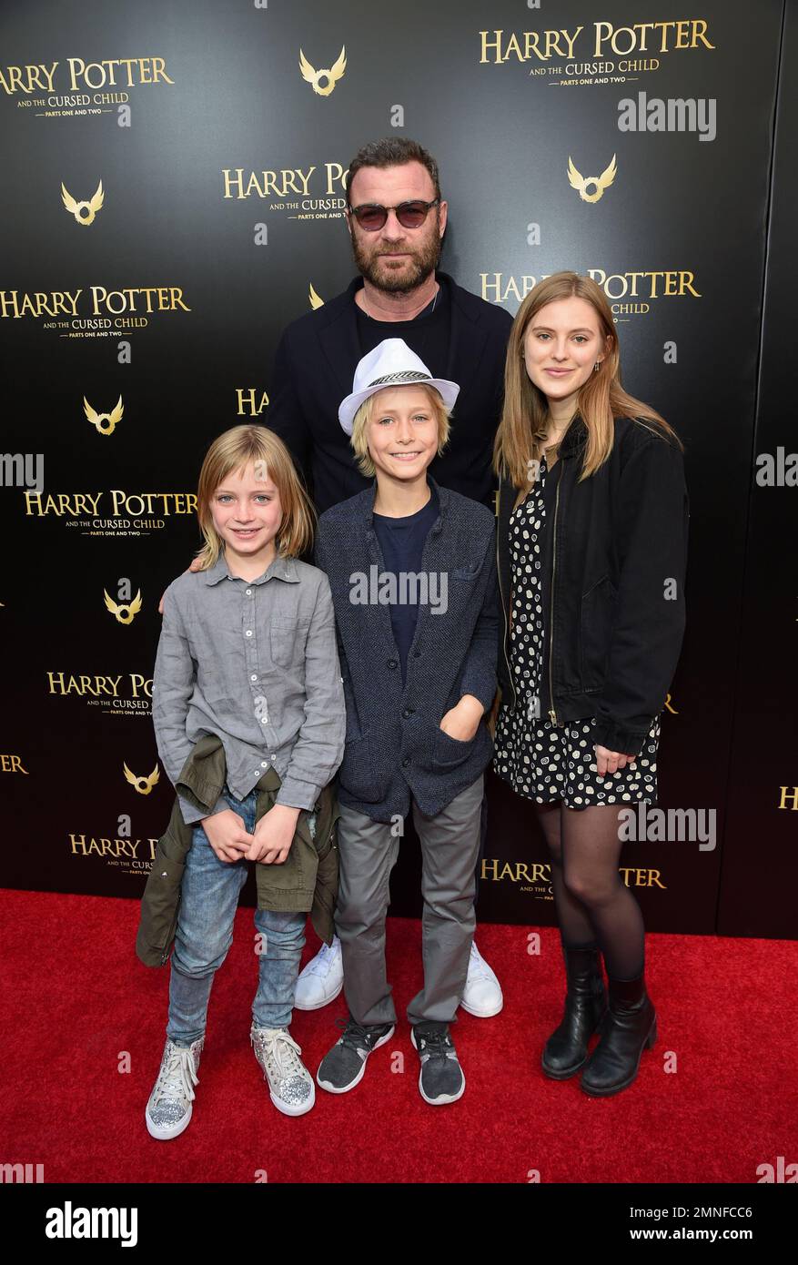 Actor Liev Schreiber poses with his girlfriend Taylor Neisen and his ...