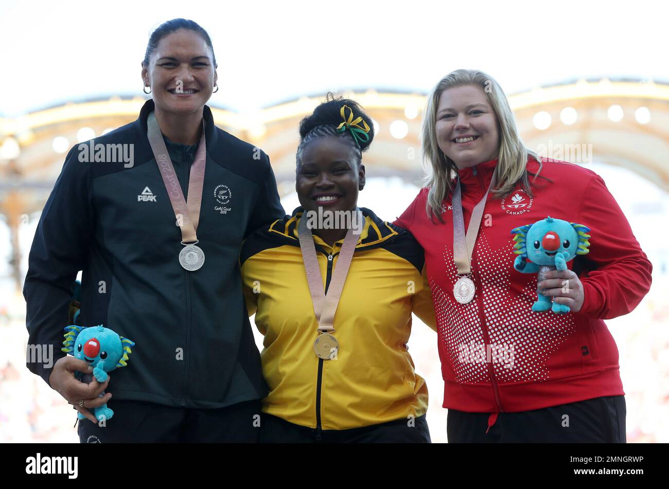 Women's shot put gold medalist Jamaica's Danniel Thomas-Dodd, centre ...