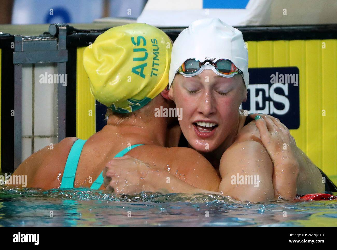 Canada's Taylor Ruck, right, is congratulated by Australia's Ariarne Titmus after winning the ...