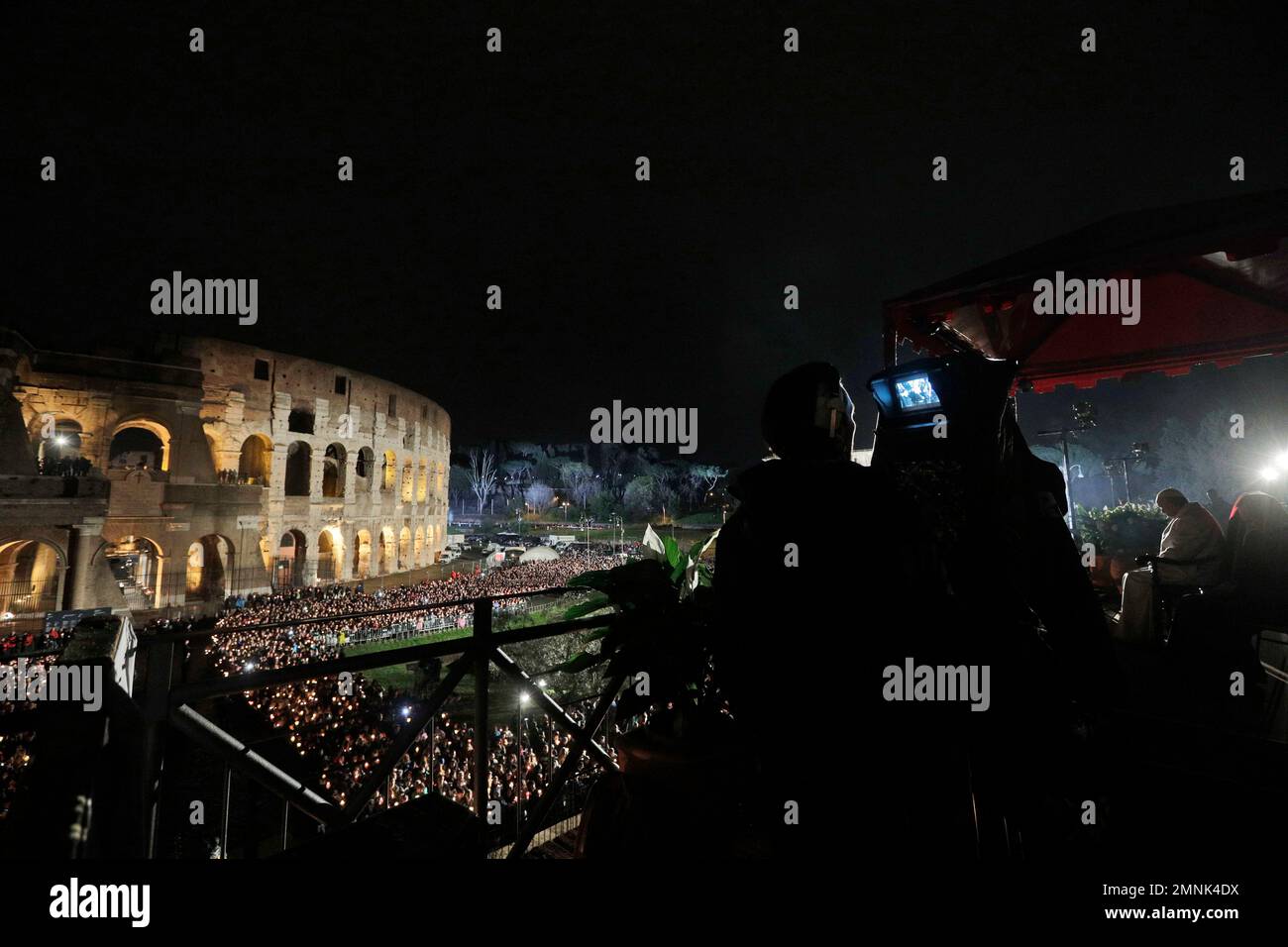 Pope Francis, right, presides over the Via Crucis (Way of the Cross ...