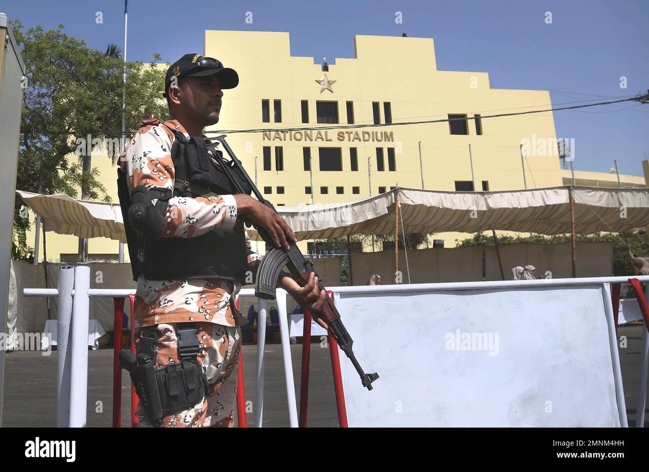 A Pakistani paramilitary soldier stands guard at the main entrance of ...