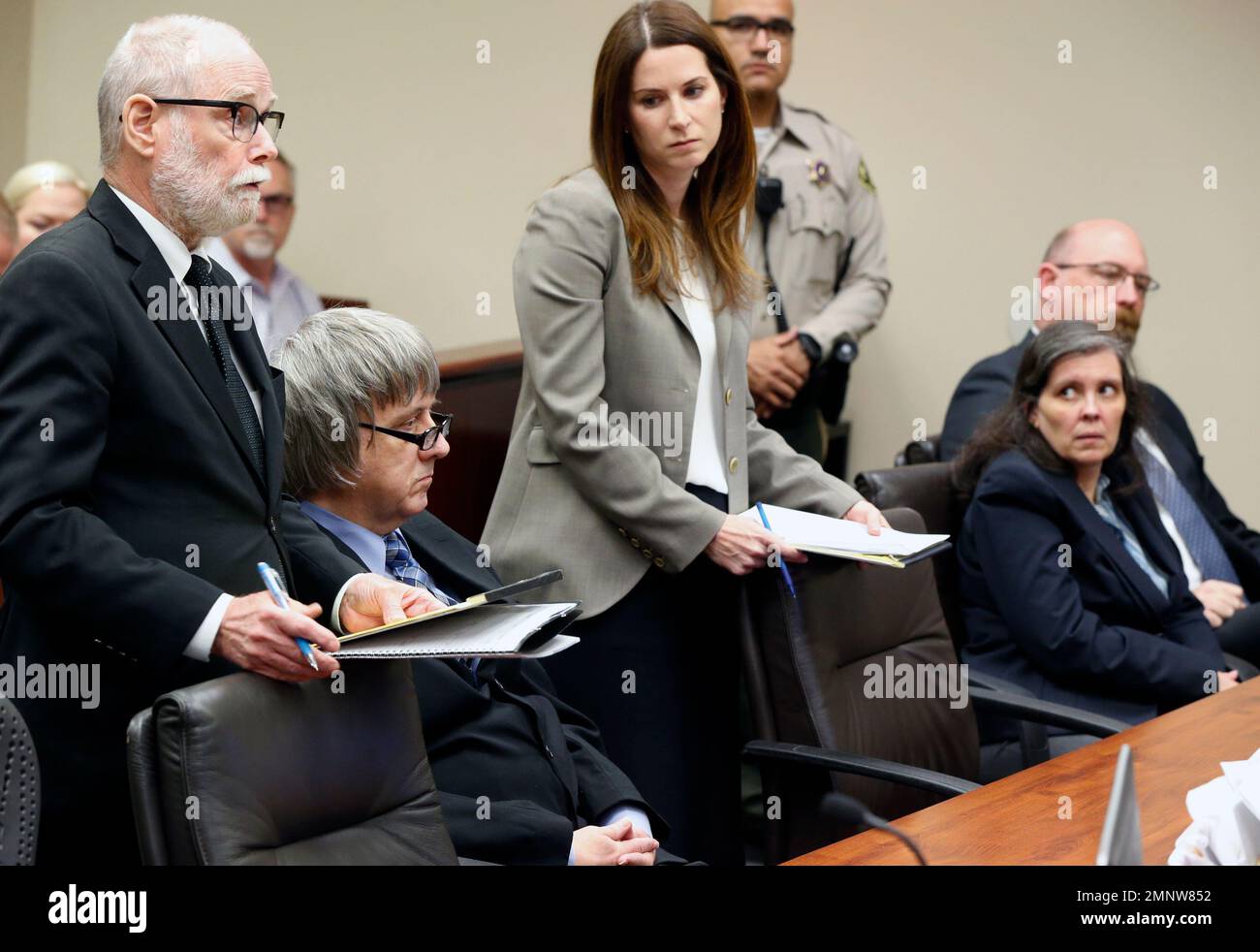David and Louise Turpin listen to attorneys, David Macher, far left ...