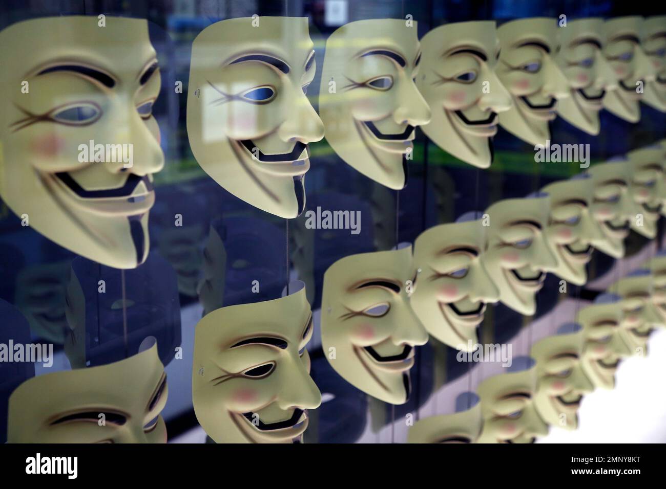 In this Monday, Feb. 12, 2018 photo, Guy Fawkes masks, often associated ...