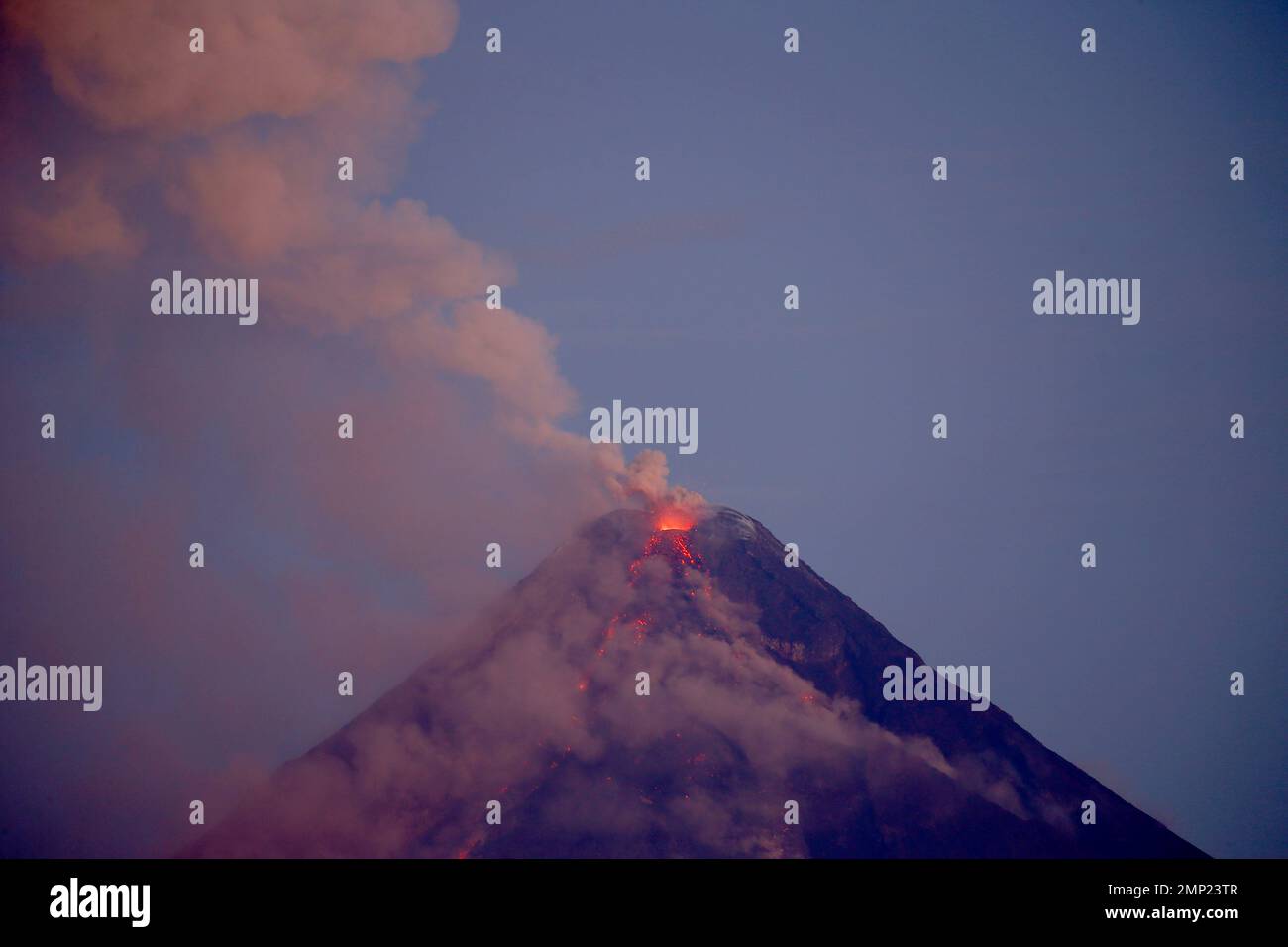 Mayon volcano spews ash anew during its mild eruption as seen in ...