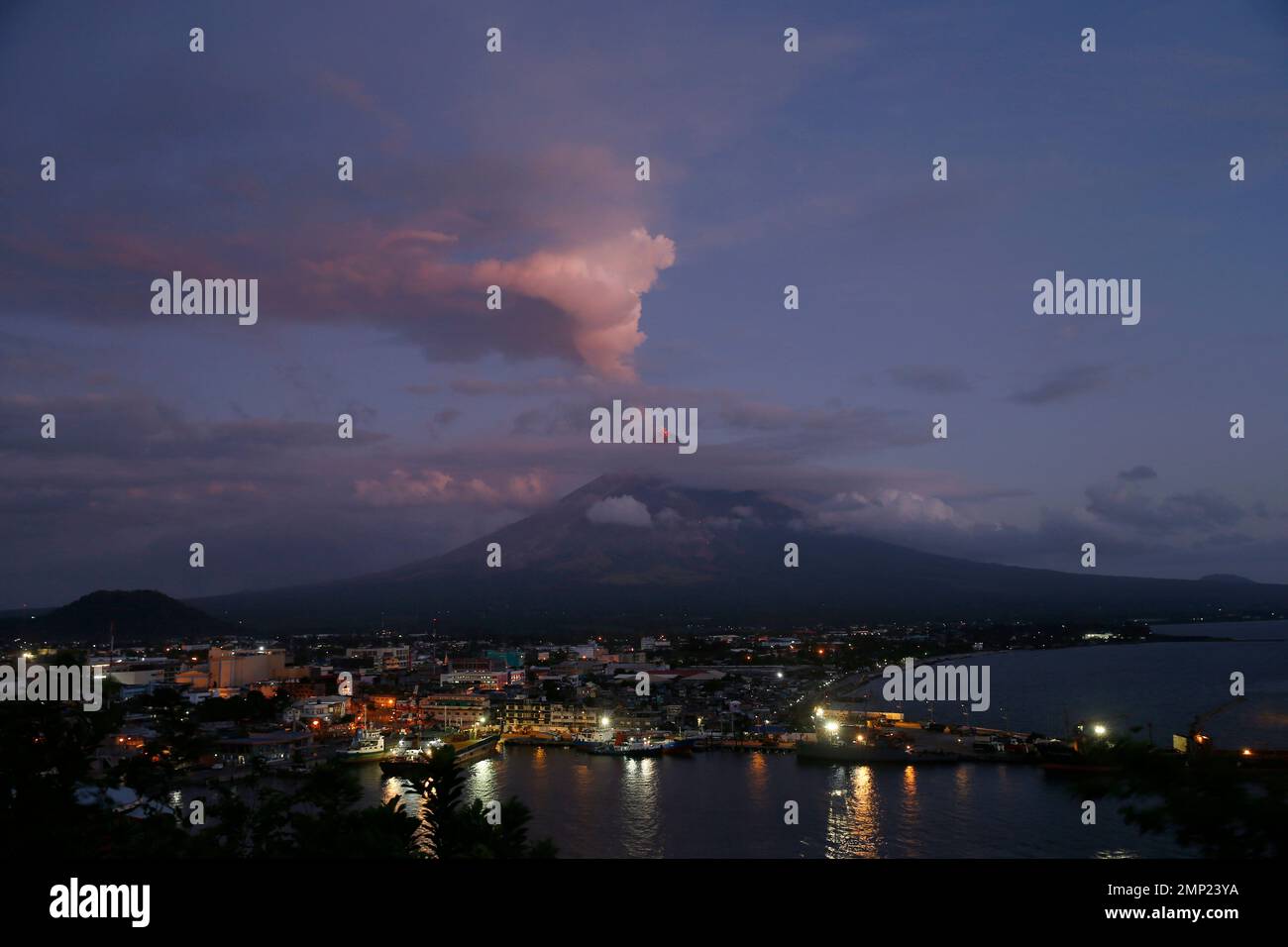Mayon volcano spews ash anew during its mild eruption as seen in ...