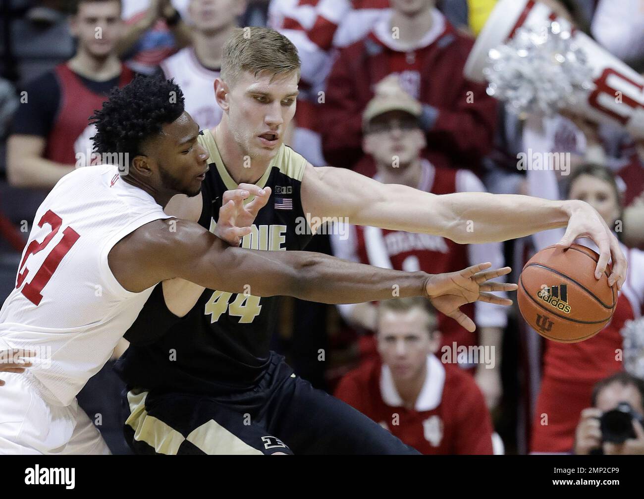 Purdue's Isaac Haas (44) is defended by Indiana's Freddie McSwain Jr ...