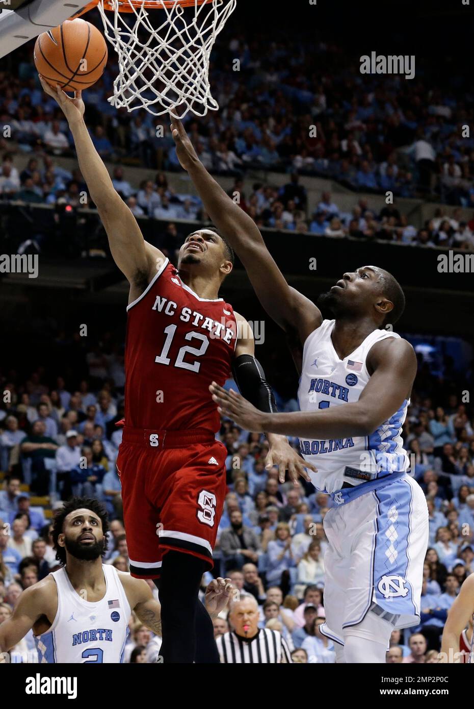 North Carolina's Theo Pinson guards North Carolina State's Allerik ...