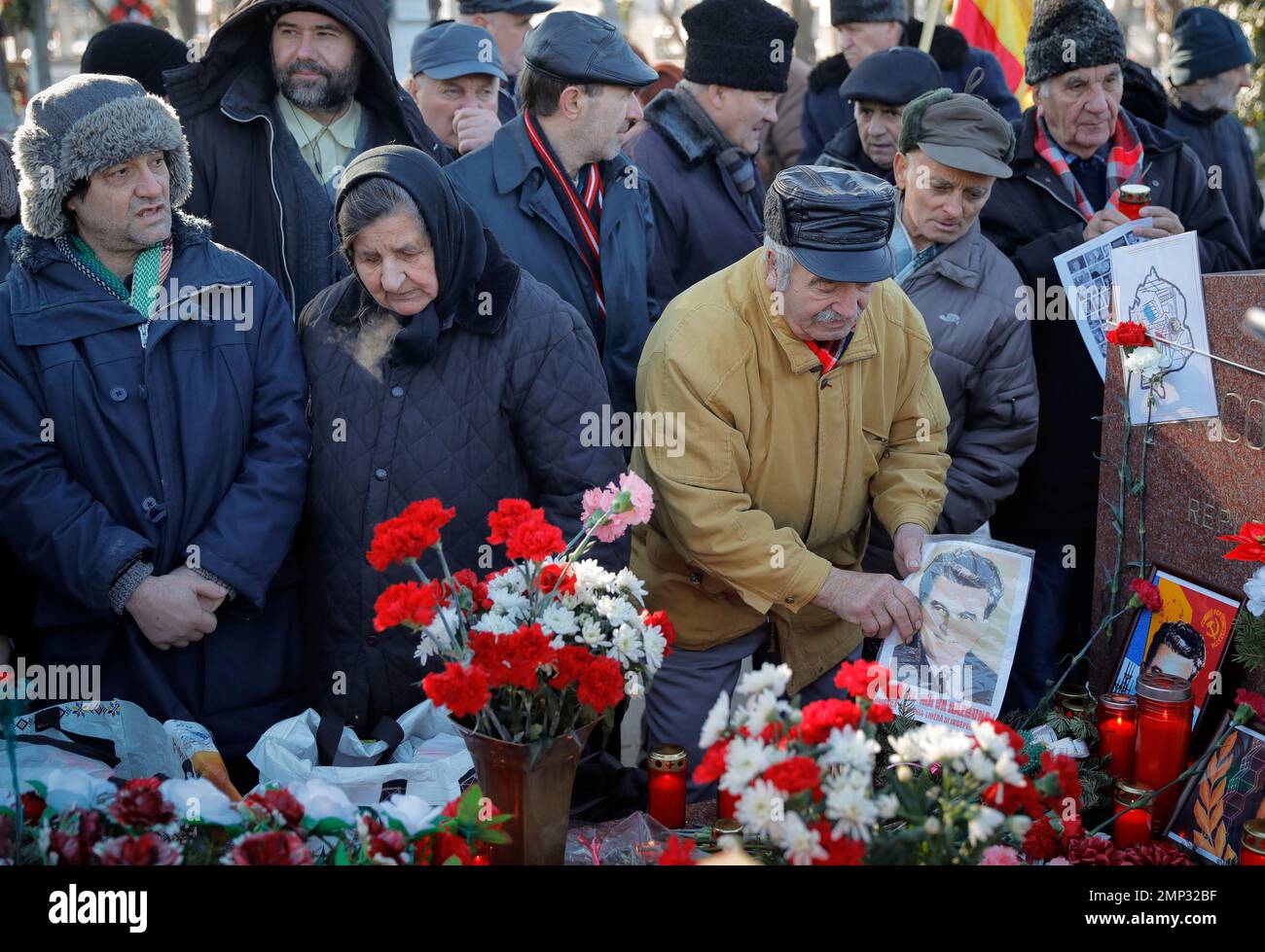 Communism nostalgics gather around the grave of Romanian communist ...