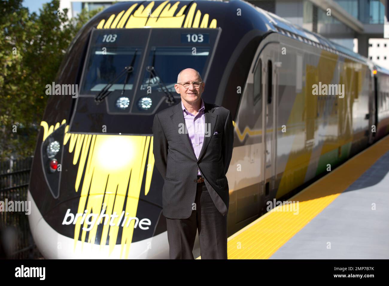Mike Reininger, Brightline's executive director stands in front of a ...