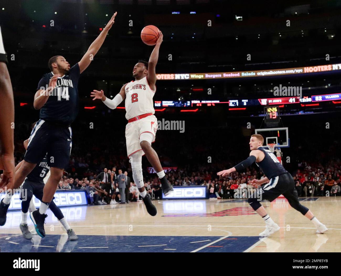 St. John's Shamorie Ponds (2) shoots over Villanova's Omari Spellman ...
