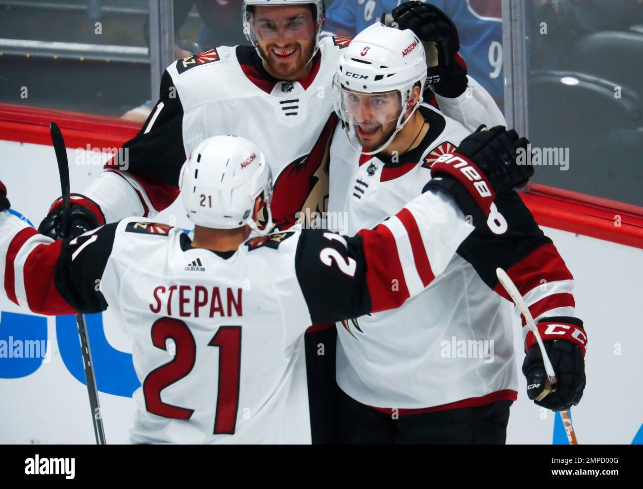 Arizona Coyotes right wing Tobias Rieder, center, of Germany, is ...