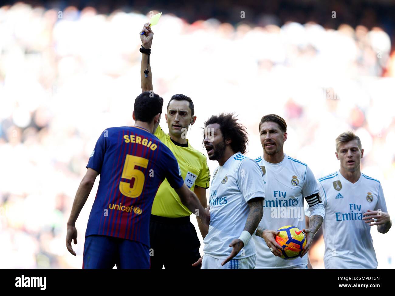 Real Madrid's Marcelo , center, gestures while Referee Jose Maria ...
