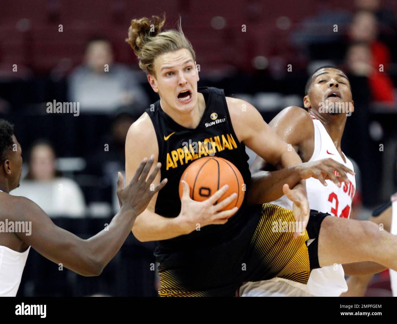 Appalachian State forward Griffin Kinney, center, works for a rebound ...