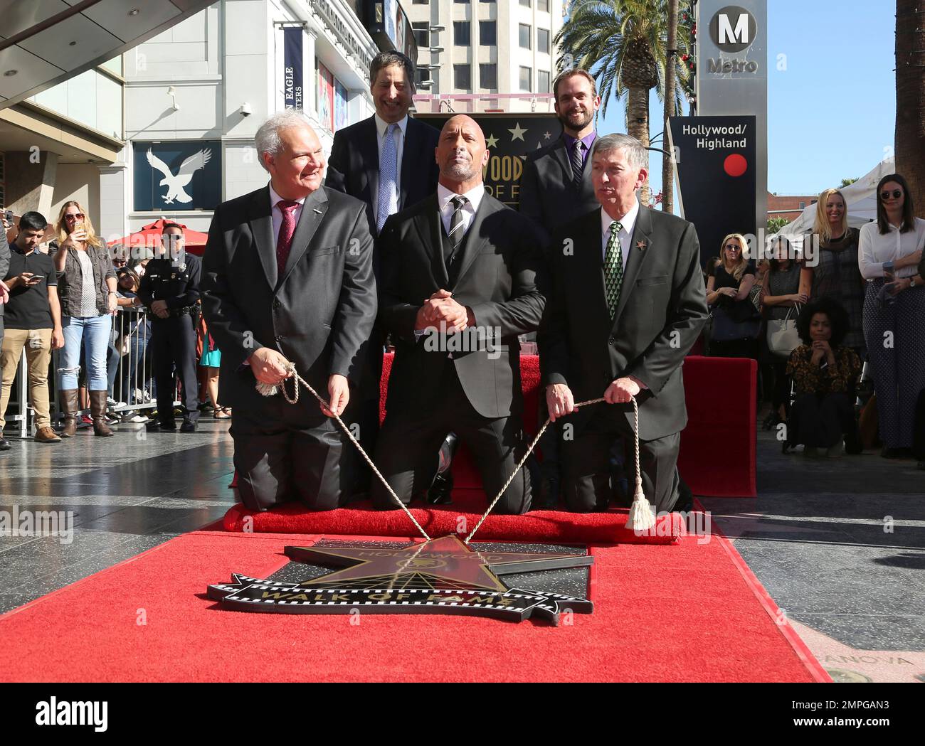 Jeff Zarrinnam, from left, Tom Rothman, Dwayne Johnson, Mitch O'Farrell ...