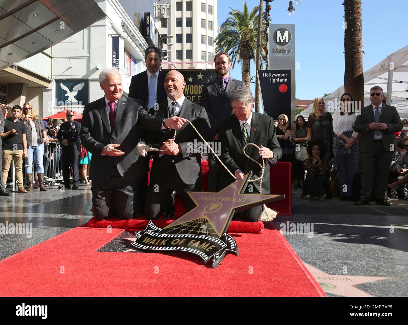 Jeff Zarrinnam, from left, Tom Rothman, Dwayne Johnson, Mitch O'Farrell ...