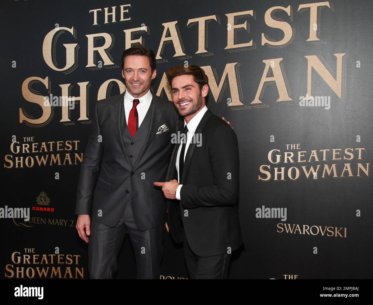 Hugh Jackman Left And Zac Efron Right Attend The World Premiere Of The Greatest Showman