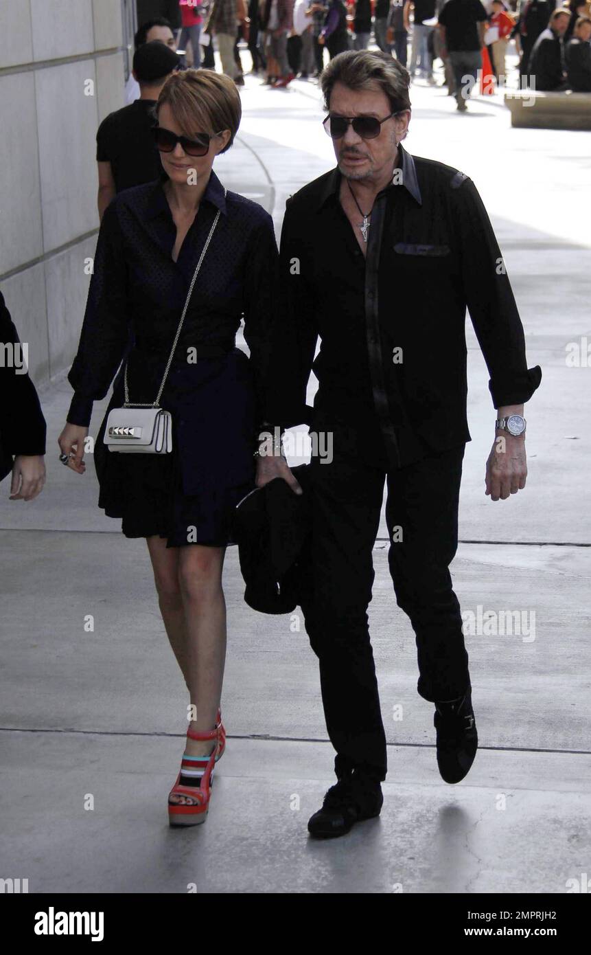 Johnny Hallyday und seine Frau Laeticia Boudou kommen im Staples Center für das Spiel Clippers ...