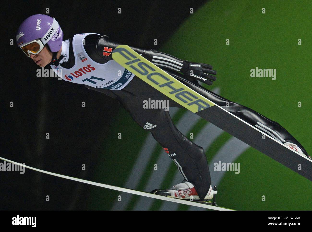 Germany's Andreas Wellinger soars through the air during the ...