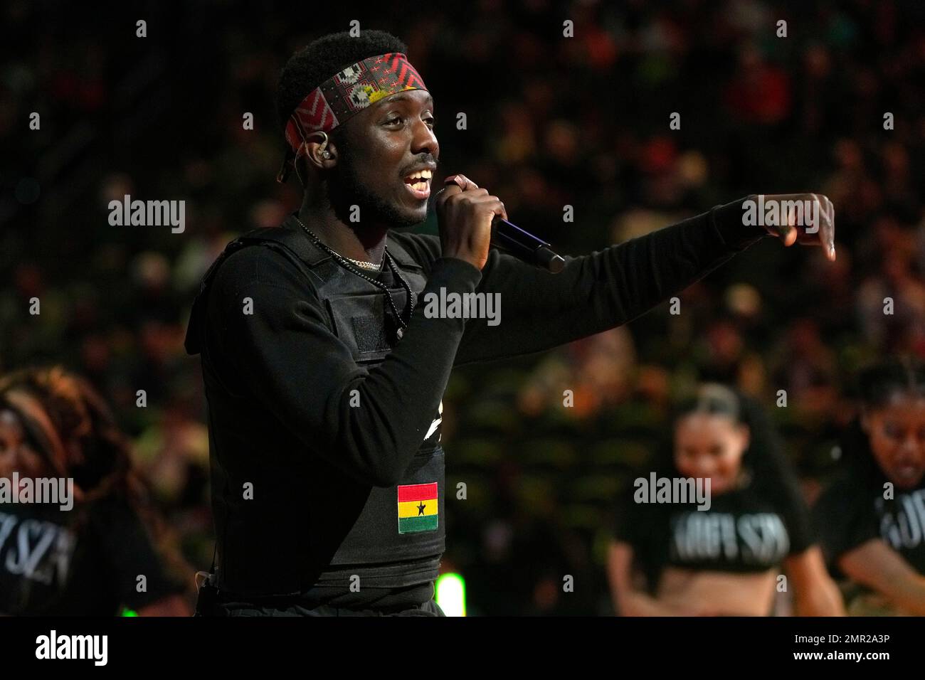 Sam Opoku performs at halftime of an NBA basketball game between the ...