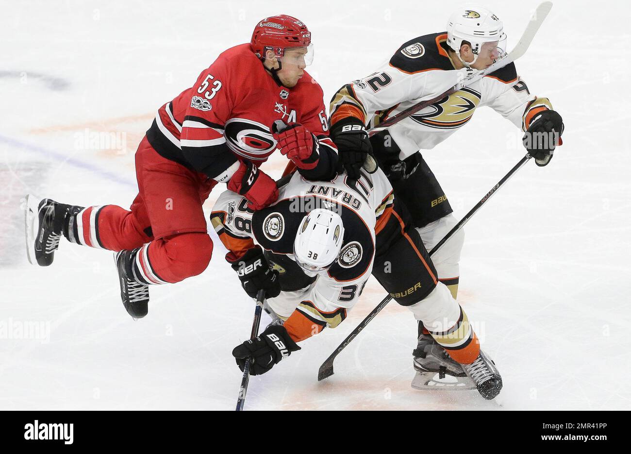 Carolina Hurricanes' Jeff Skinner (53) jumps while chasing the puck ...