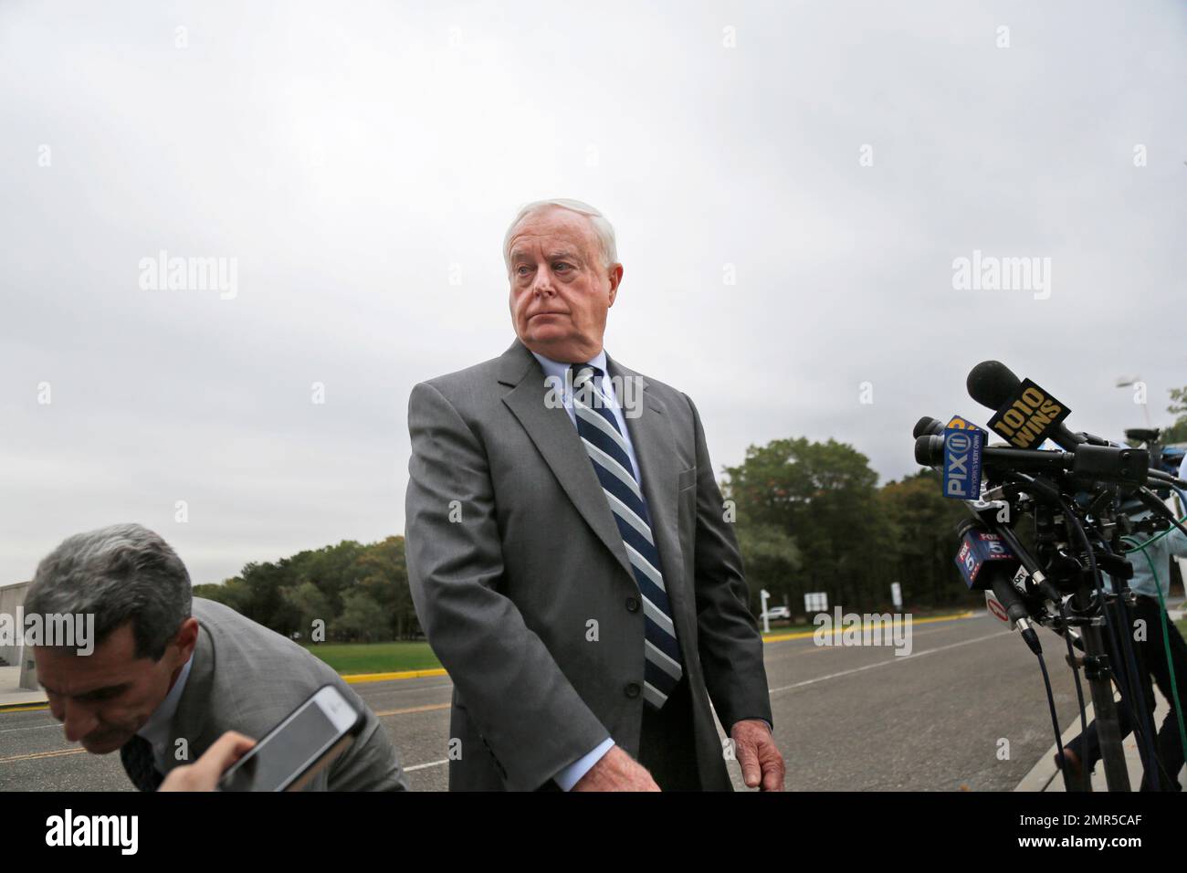 Suffolk County District Attorney Thomas Spota prepares to leave after ...
