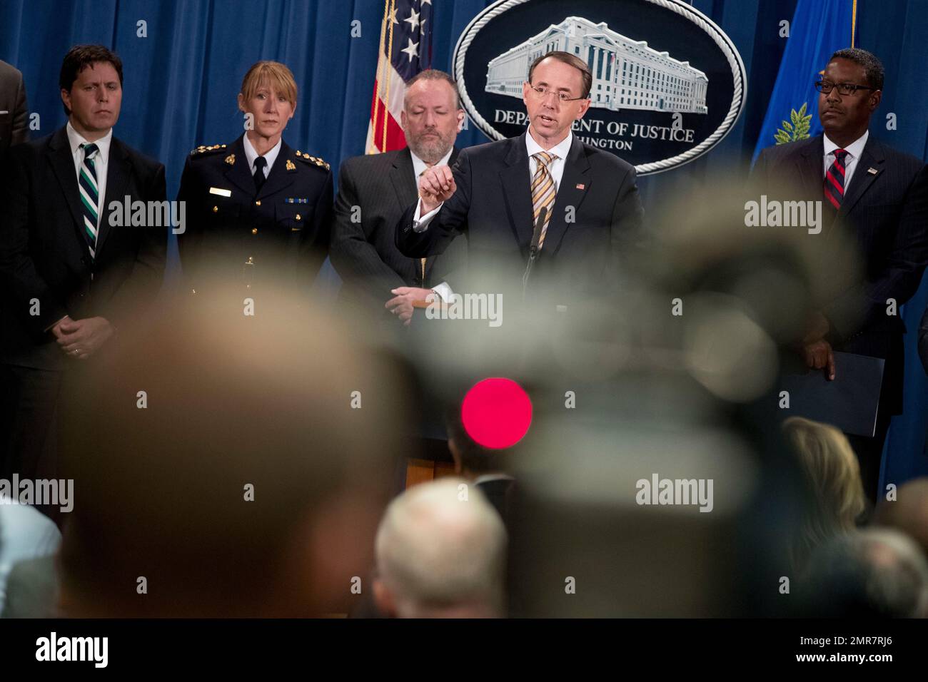 Deputy Attorney General Rod Rosenstein, second from right, accompanied ...