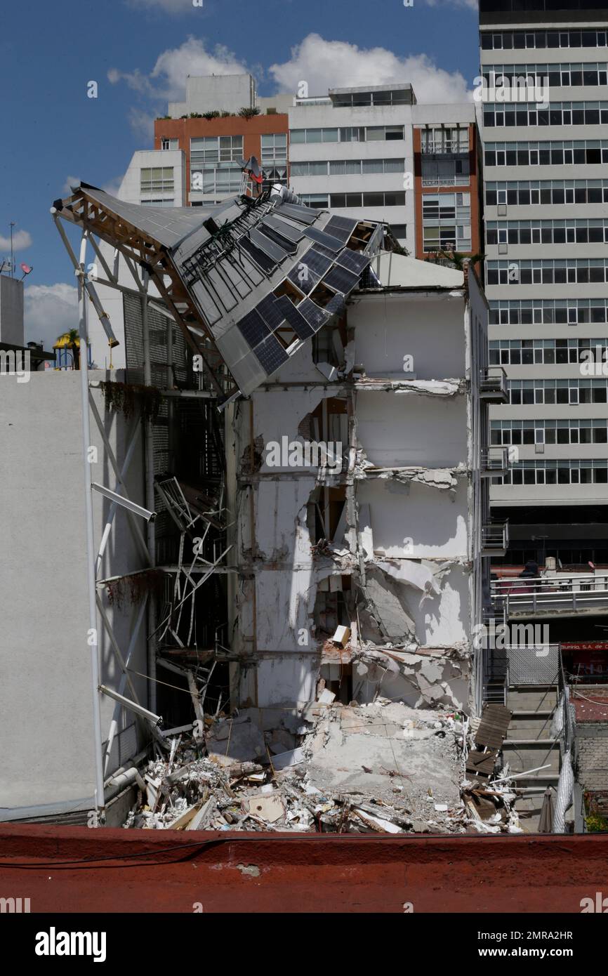 This Oct. 6, 2017 photo shows an apartment building that was partially ...