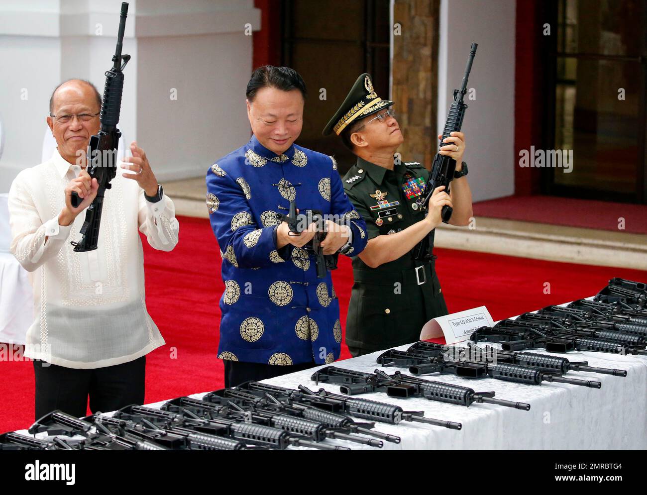 From left, Philippine Defense Secretary Delfin Lorenzana, Chinese ...