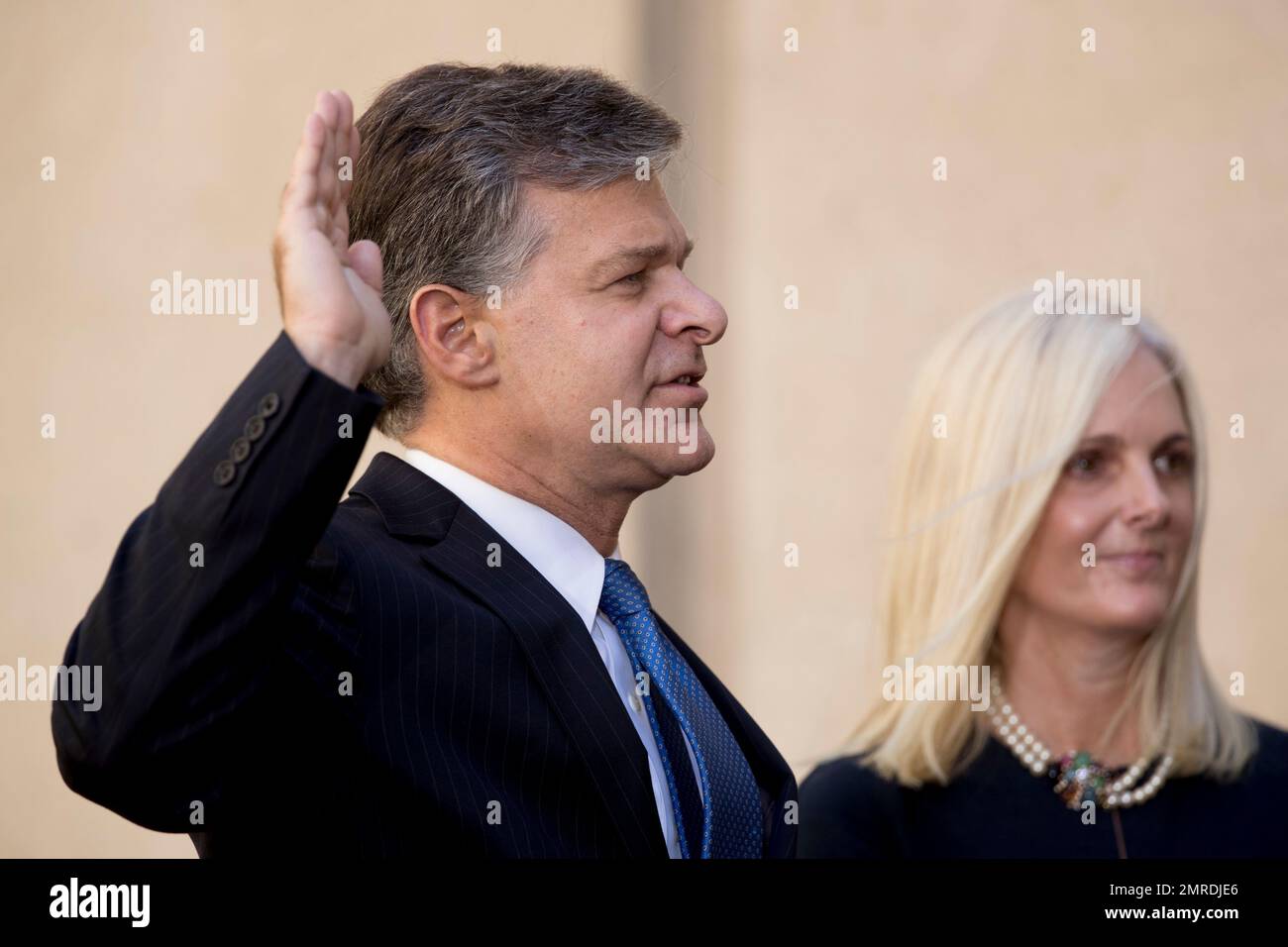 FBI Director Chris Wray, accompanied by his wife Helen garrison Howell ...