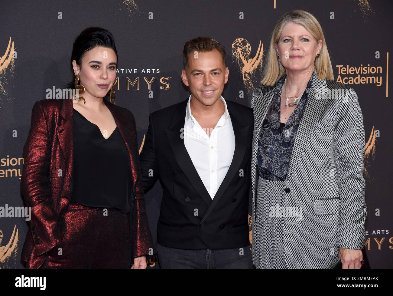 Jennifer Salim, from left, Paolo Nieddu, and Mary Lane arrive at night ...