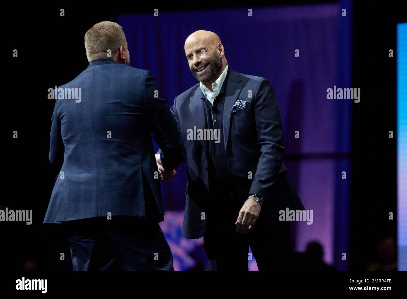 Boeing Commercial Airplanes CEO Stan Deal, left, shakes actor John ...