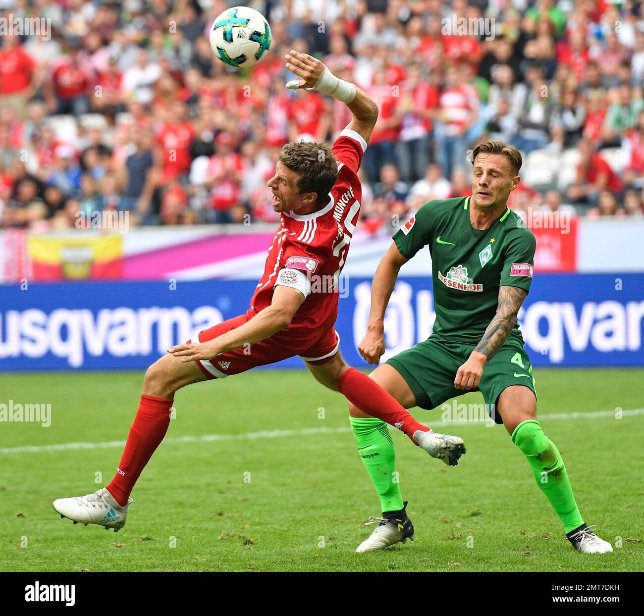 Bayern's Thomas Mueller, left, and Bremen's Robert Bauer Robert Bauer ...