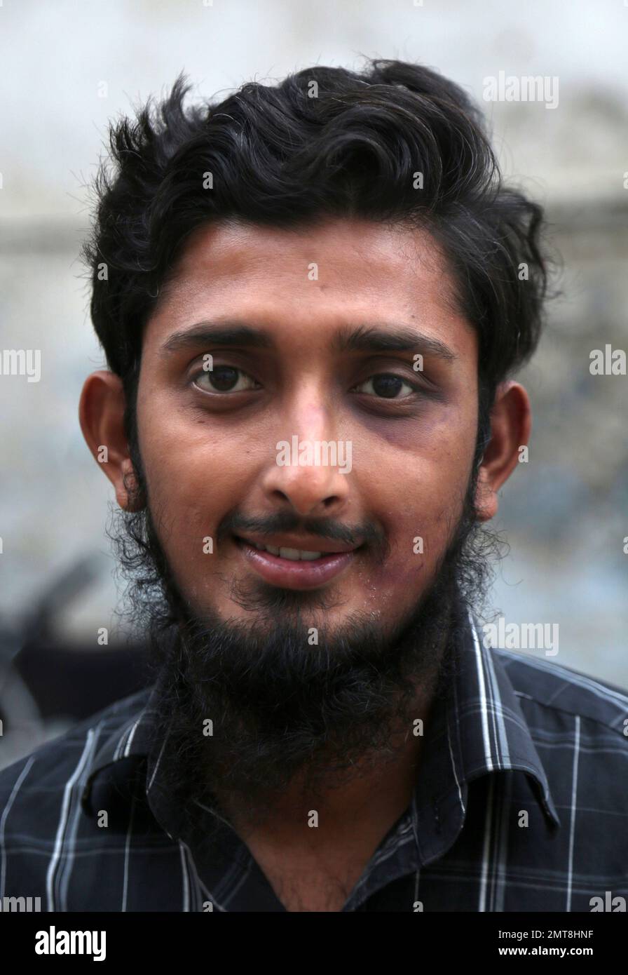 Pakistani journalist Abdullah Zafar poses for photograph at his office ...
