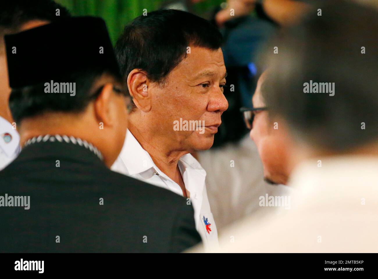 Philippine President Rodrigo Duterte, center, arrives as Al-Hajj Murad ...