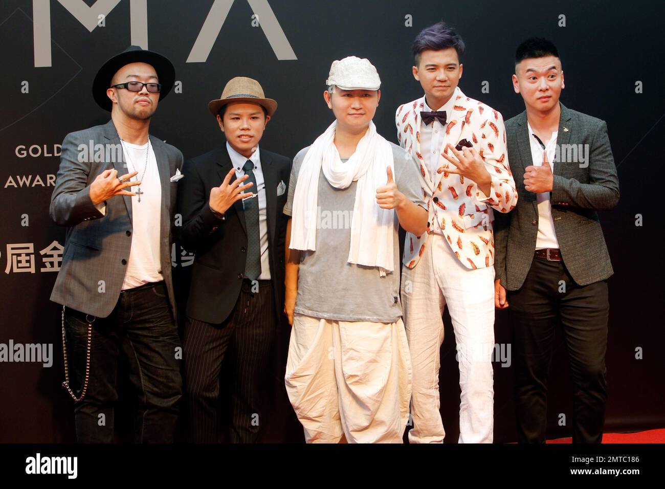 Taiwanese pop group Chang & Lee pose for media as they arrive at the ...