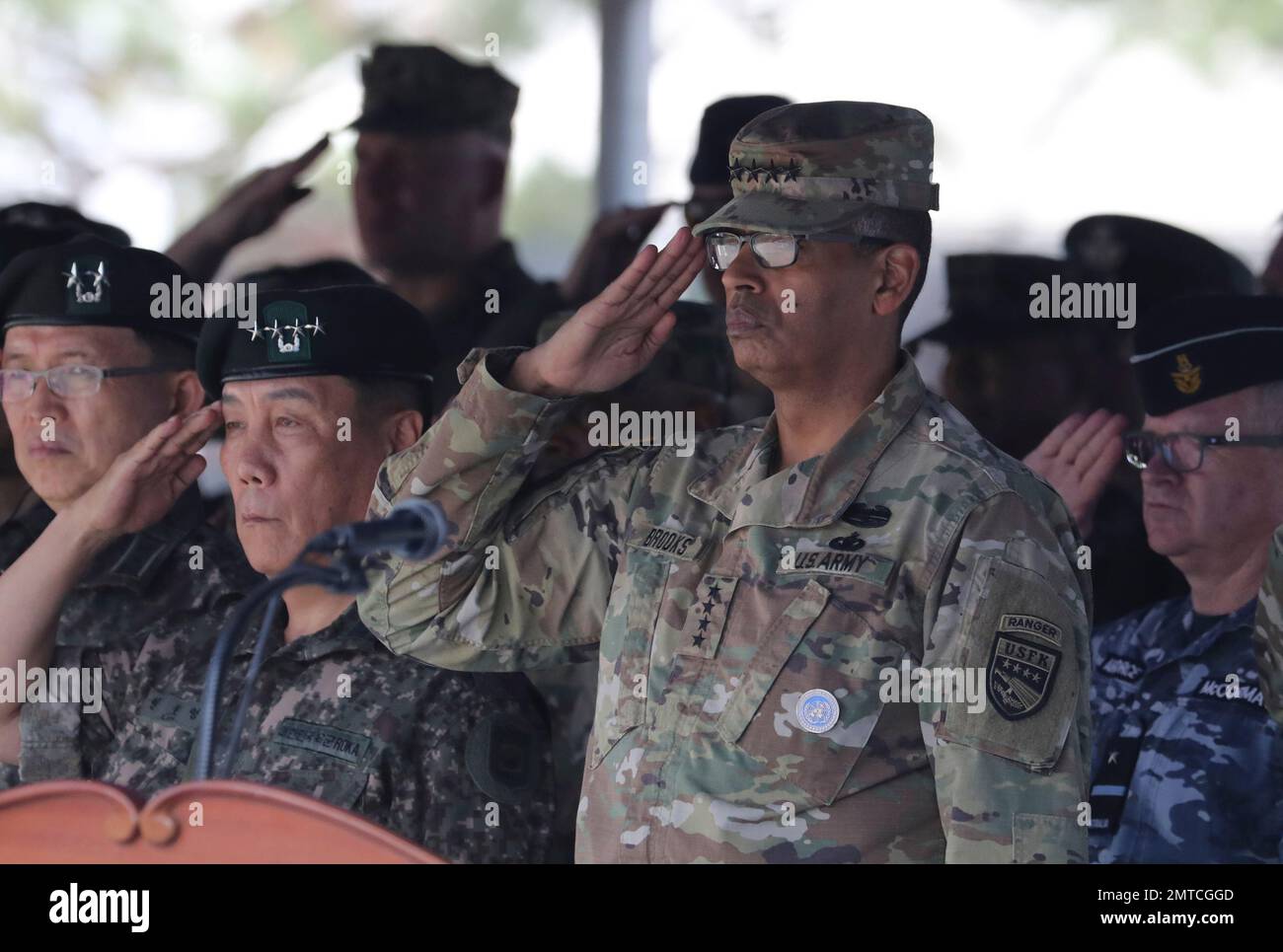 U.S. Gen. Vincent Brooks, center, commander of the United Nations ...