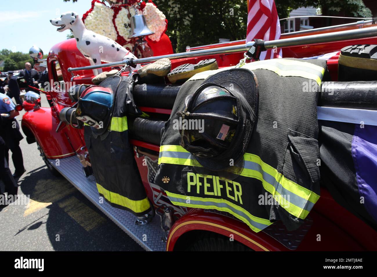 The jacket and helmet of retired New York City firefighter Raymond ...