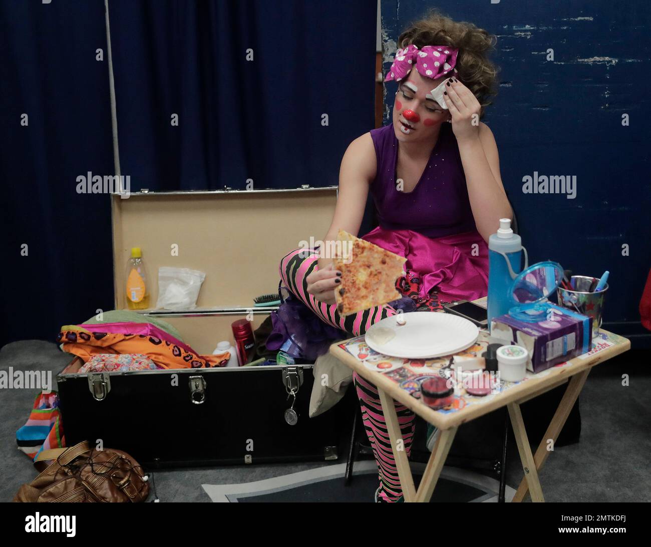 Beth Walters, takes a break in Clown Alley between acts during a show ...