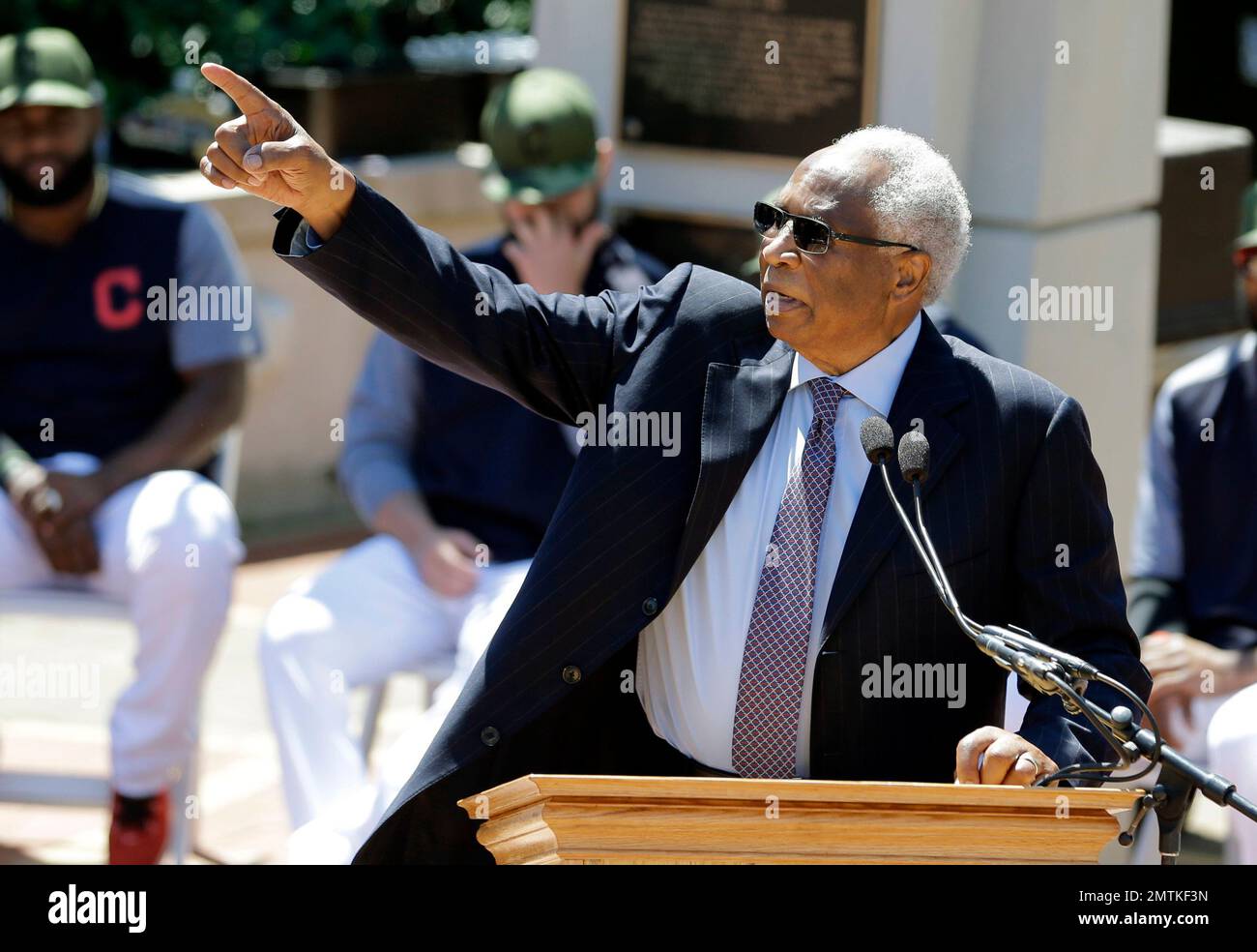 Frank Robinson speaks after his statue was unveiled before a baseball ...