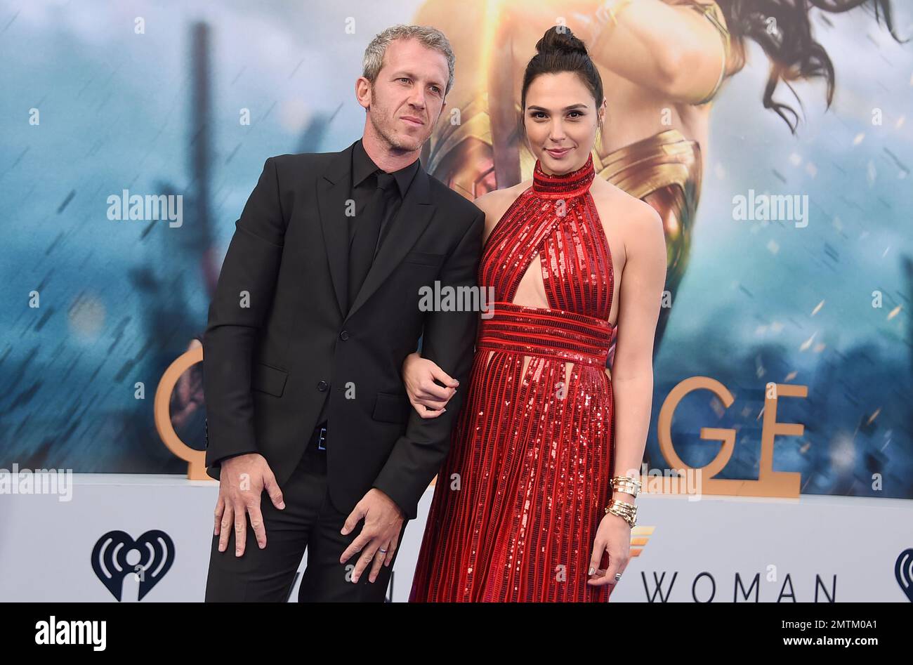 Gal Gadot, right, and Yaron Versano arrive at the world premiere of ...