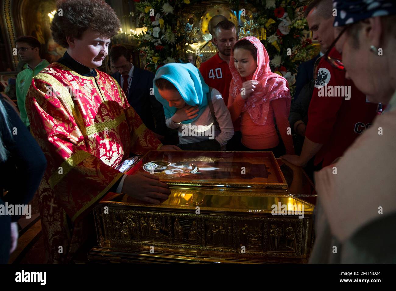 Russian Orthodox believers line up to kiss the relics of Saint Nicholas ...