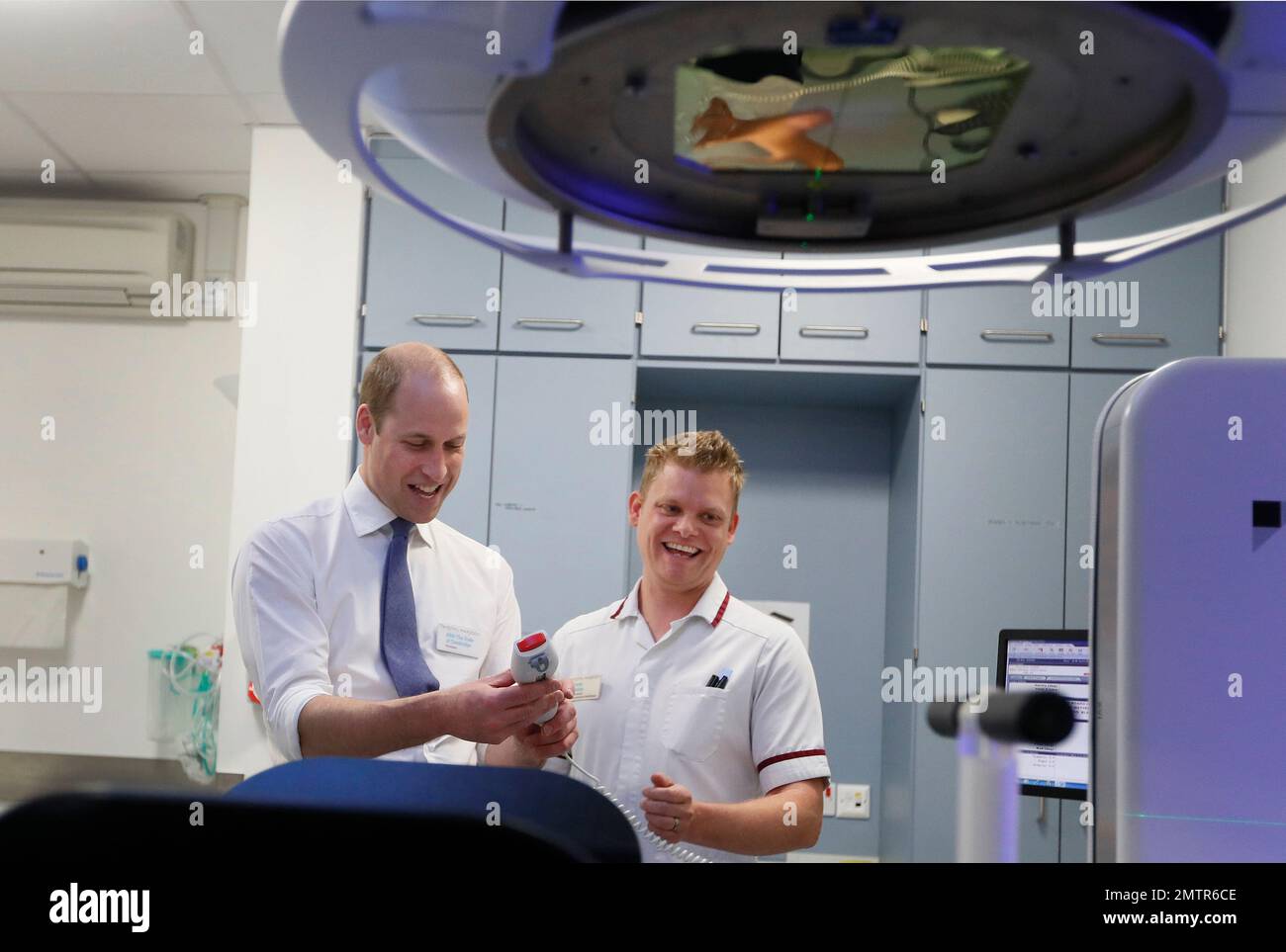 Britain's Prince William is shown a Linear excelerator in the ...