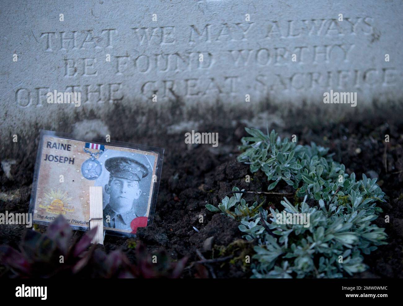 A photo of World War I soldier Joseph Raine stands in front of an ...