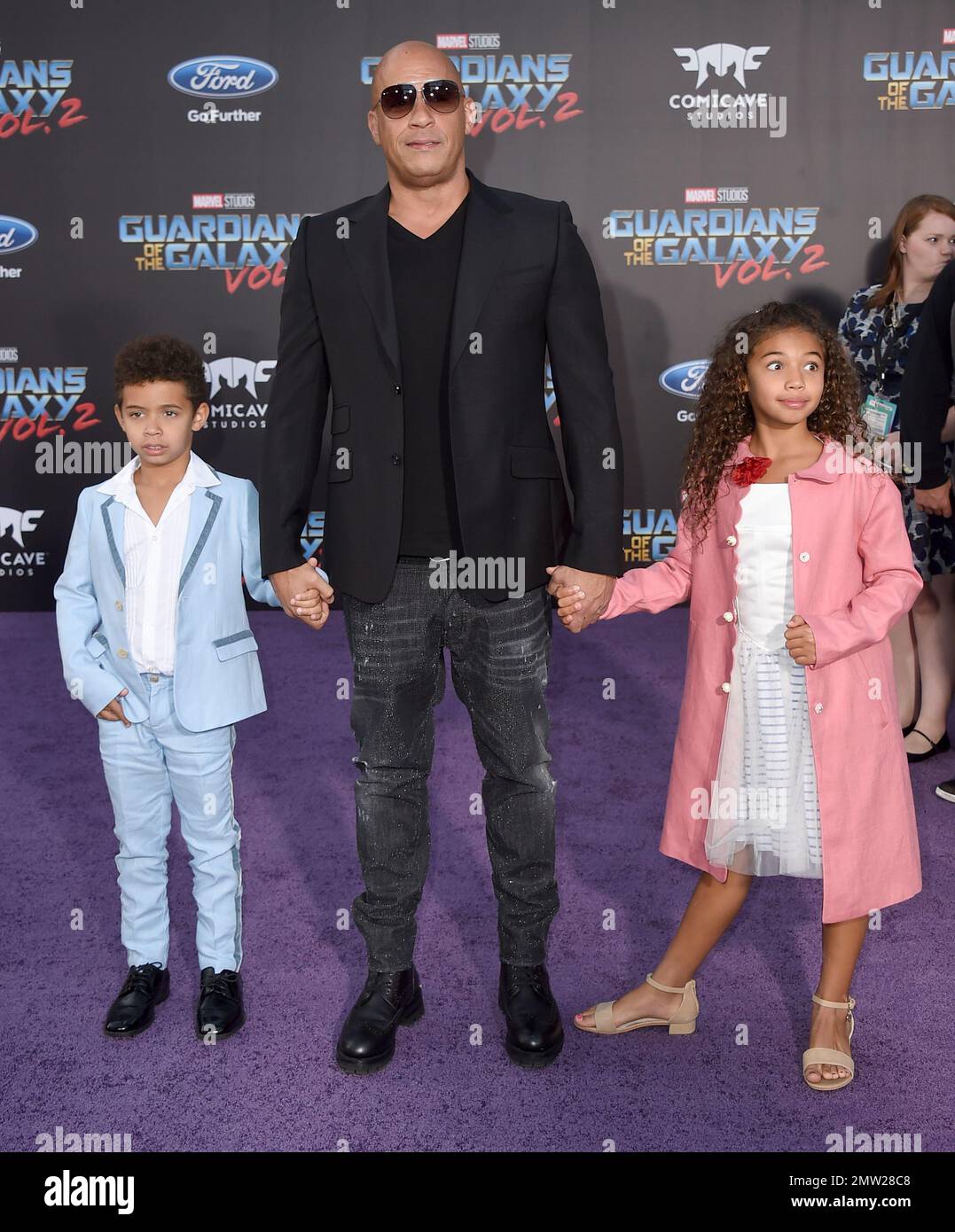 Vin Diesel, center, and his children, form left, Vincent Sinclair and ...