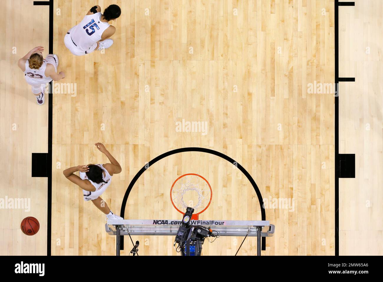 Connecticut's Napheesa Collier, bottom, Katie Lou Samuelson (33) and ...