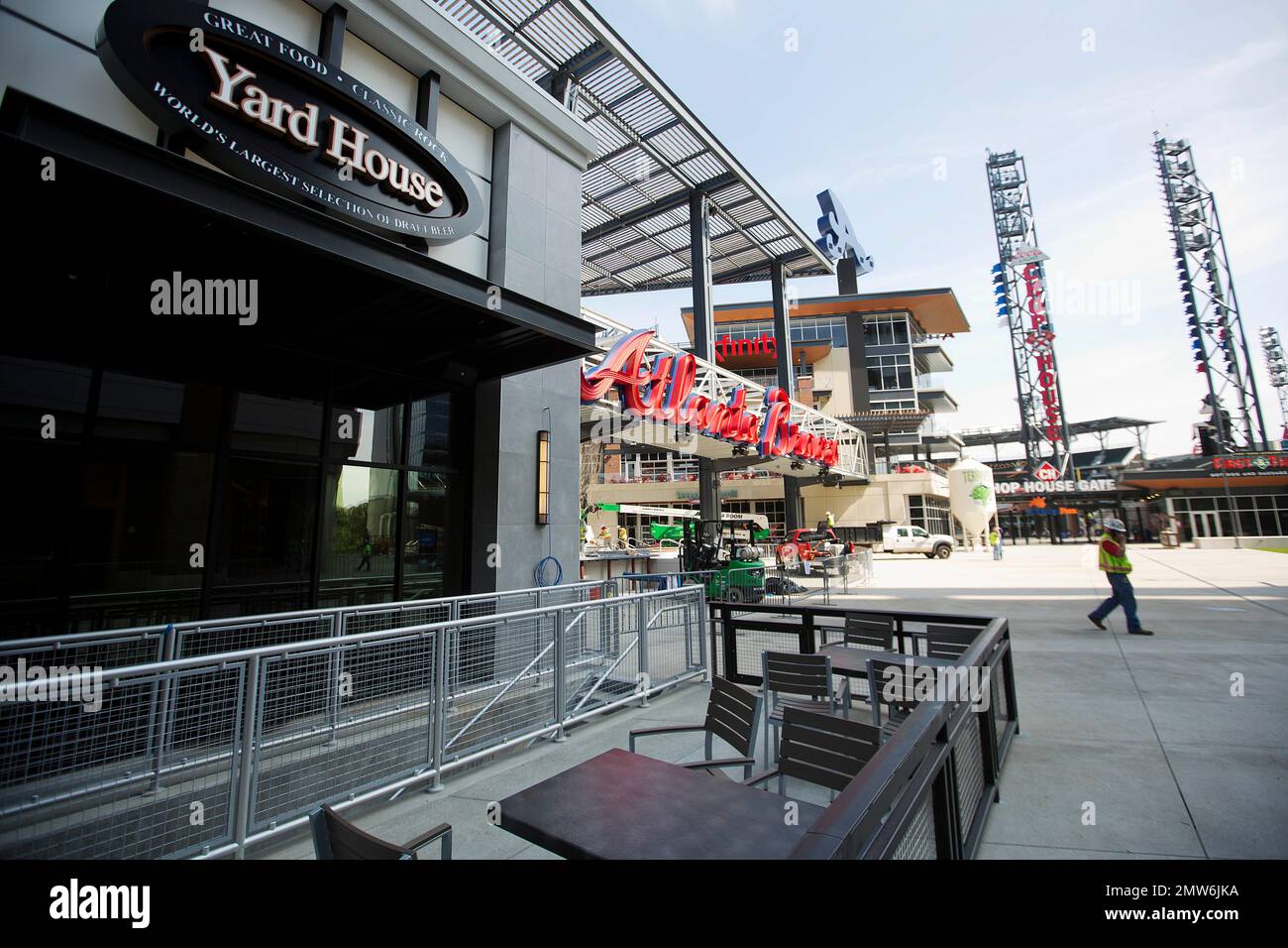 Outdoor seating at a restaurant in the mixed-use area featuring dining ...