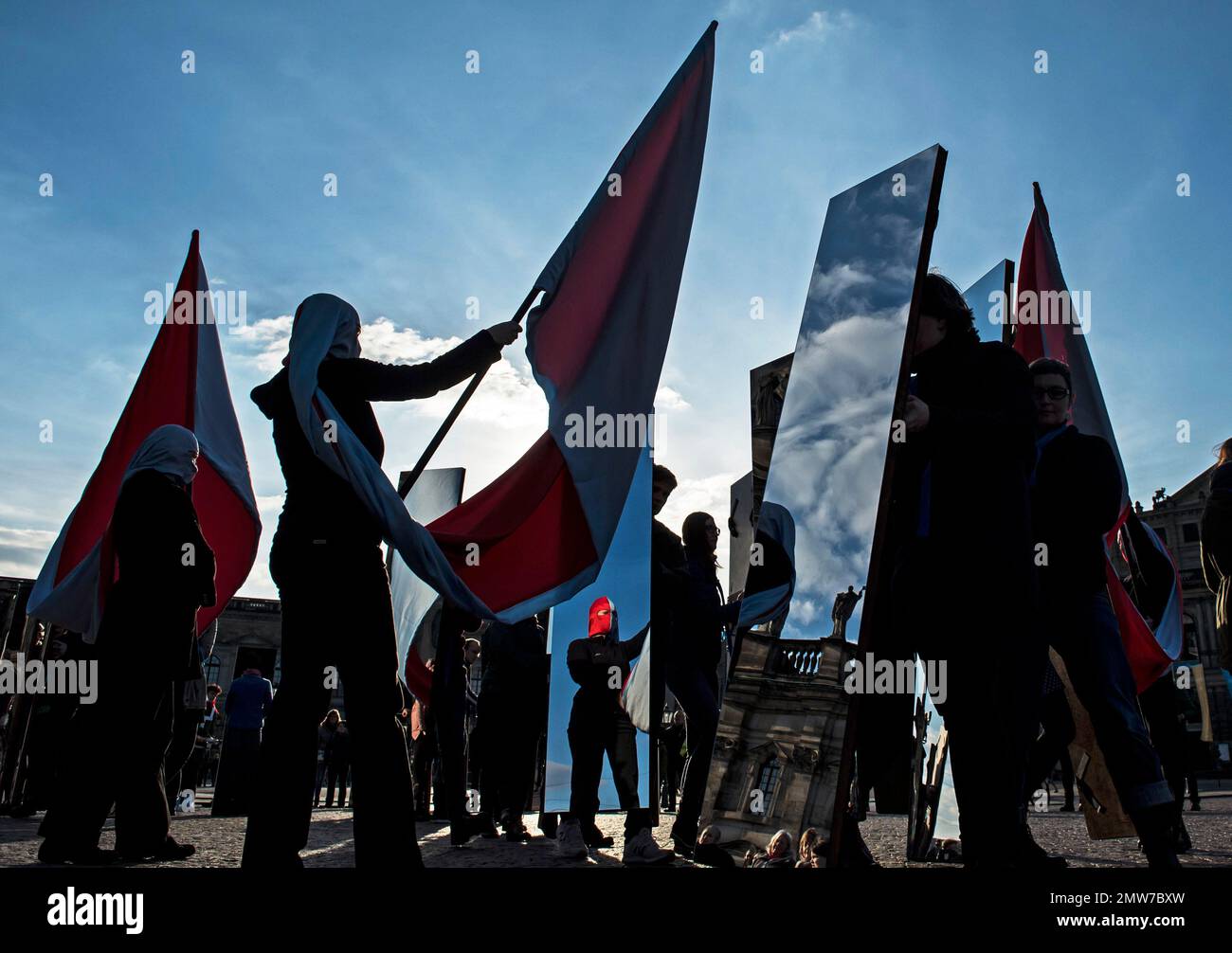 Participants of a so-called 'Mirror March' (Spiegelmarsch) art ...
